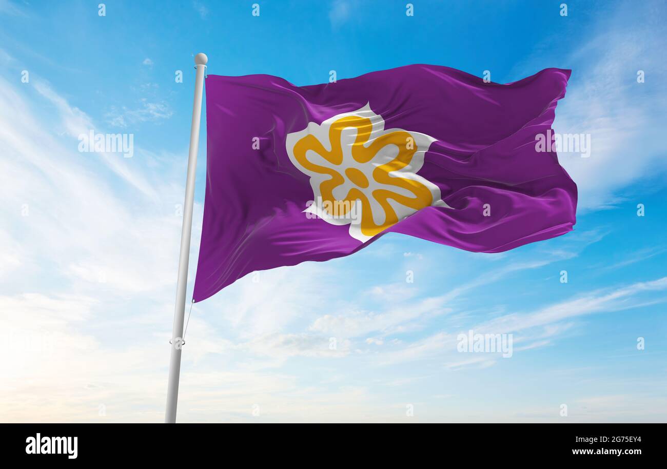 official flag of Kyoto prefecture waving in the wind on flagpoles ...