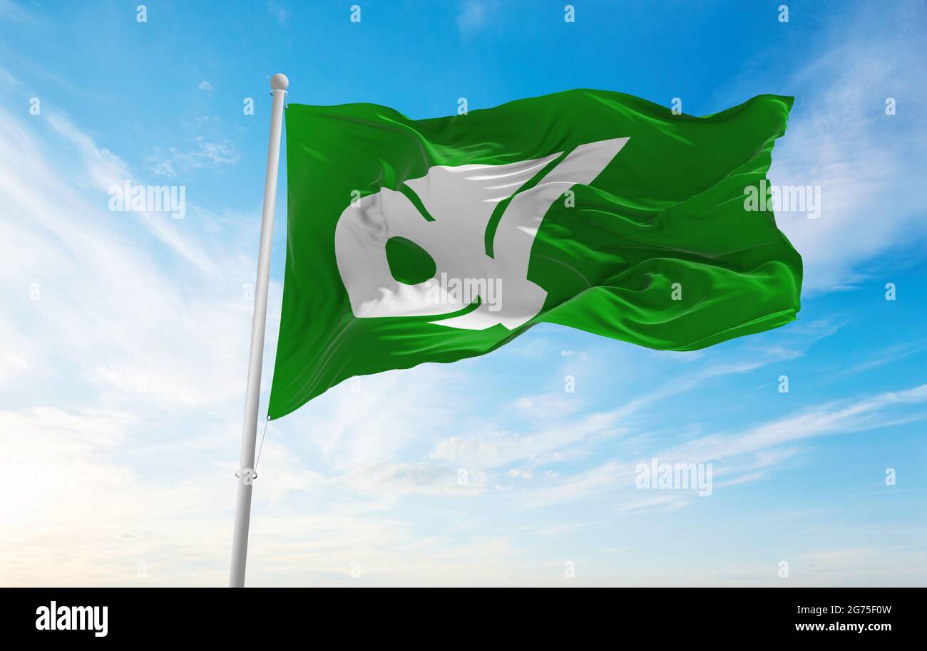 official flag of Mie prefecture waving in the wind on flagpoles against ...