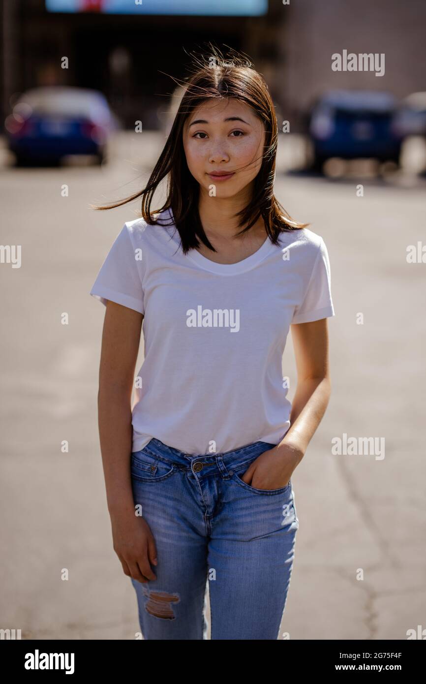 Portraits of Young Asian Woman Walking in a Downtown Parking Lot Stock ...