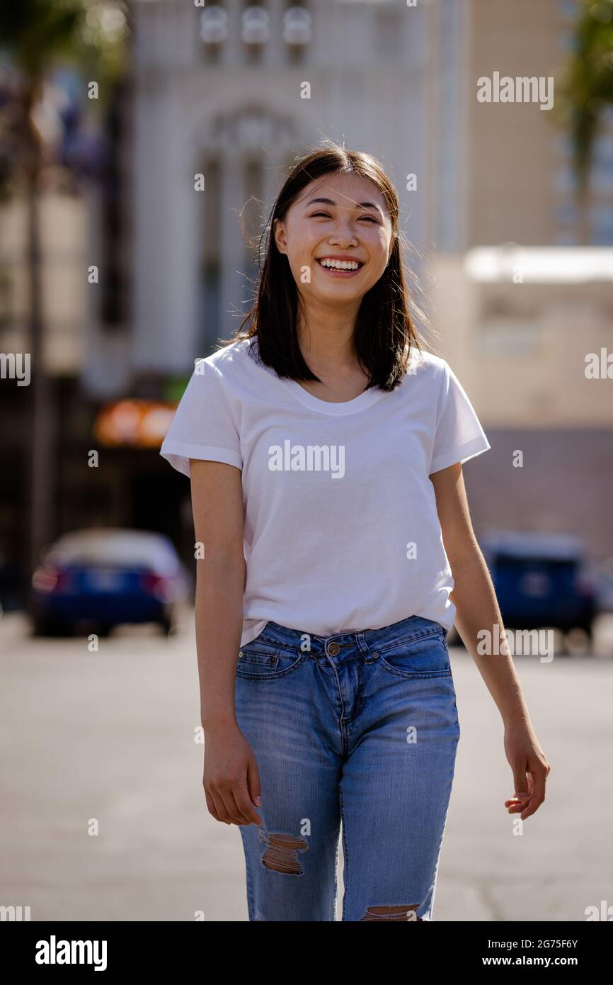 Portraits of Young Asian Woman Walking in a Downtown Parking Lot Stock ...