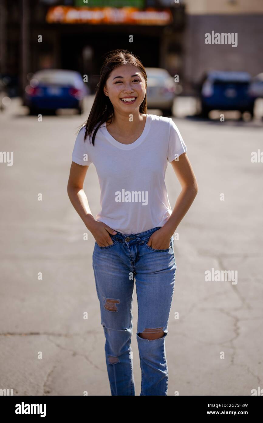 Portraits of Young Asian Woman Walking in a Downtown Parking Lot Stock ...