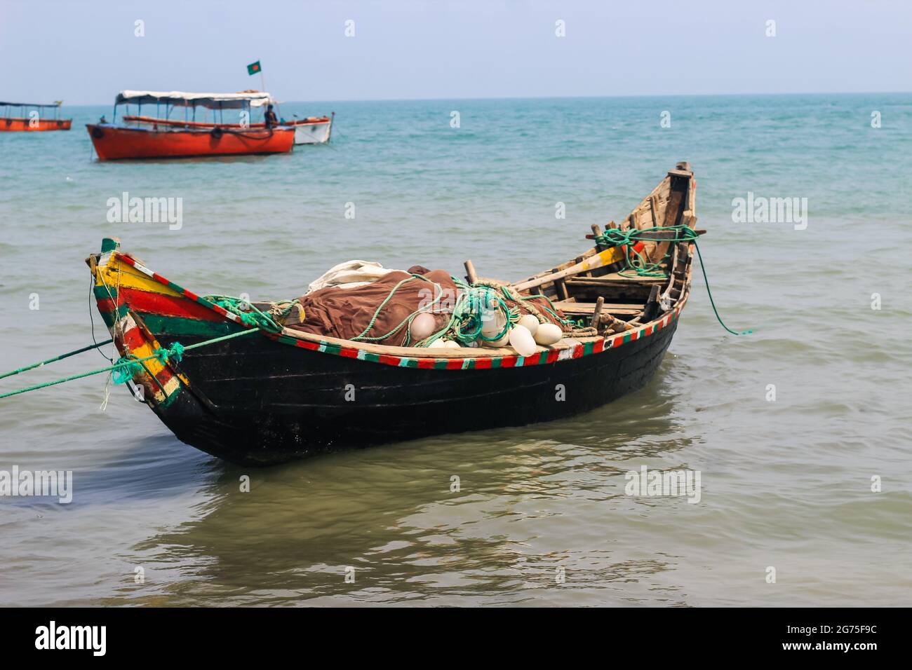 Bangladeshi traditional fishing boat on St. Martin's Island. Fisherman ...