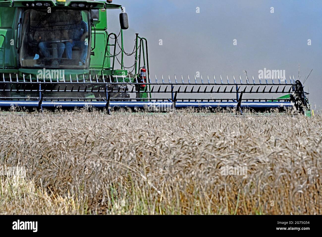 An S770 John Deere combine with a 735FD cutter header attached in the ...