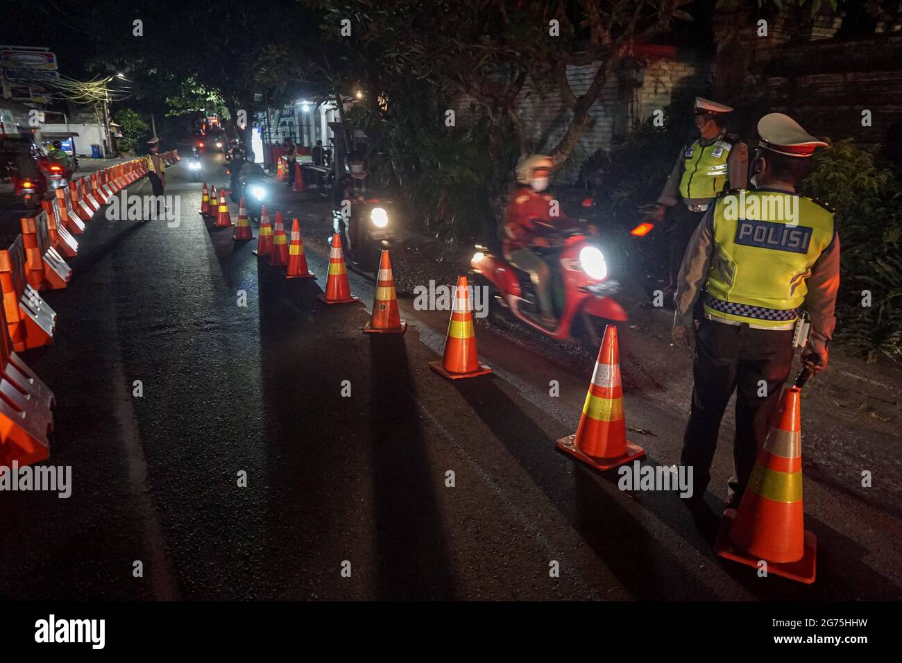 Badung, Bali, Indonesia. 11th July, 2021. Barricade of road blockades ...