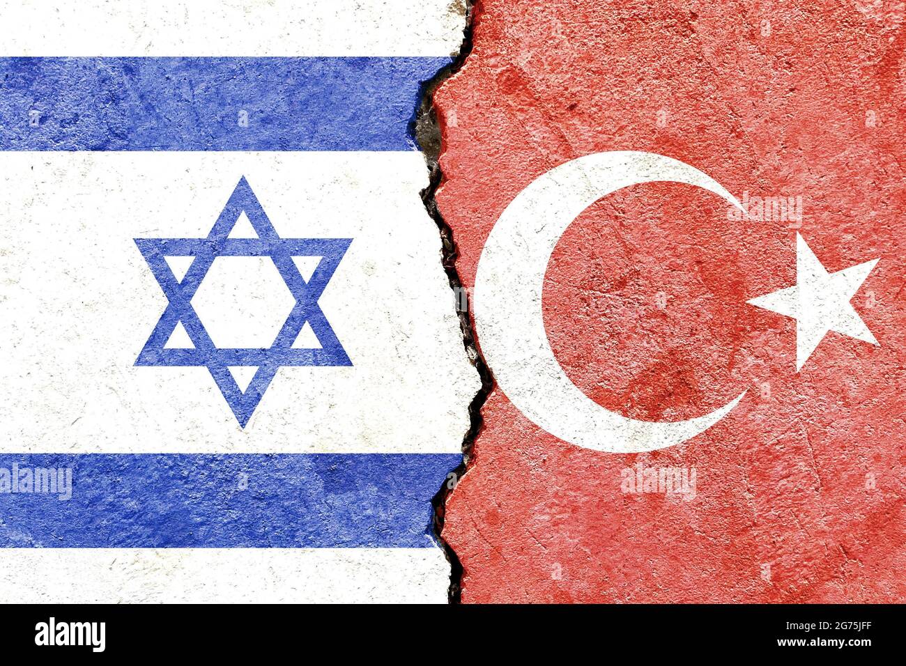 The flags of Israel and Turkey painted on a weathered broken wall ...