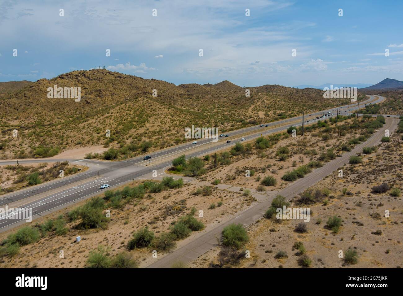 Panoramic aerial view highway across the arid desert Arizona mountains ...