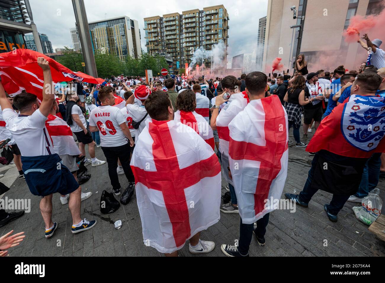 London, UK. 11 July 2021. England fans light flares outside Wembley ...