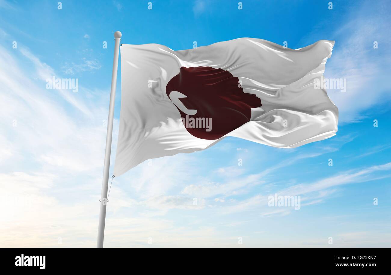 official flag of Nara prefecture waving in the wind on flagpoles ...