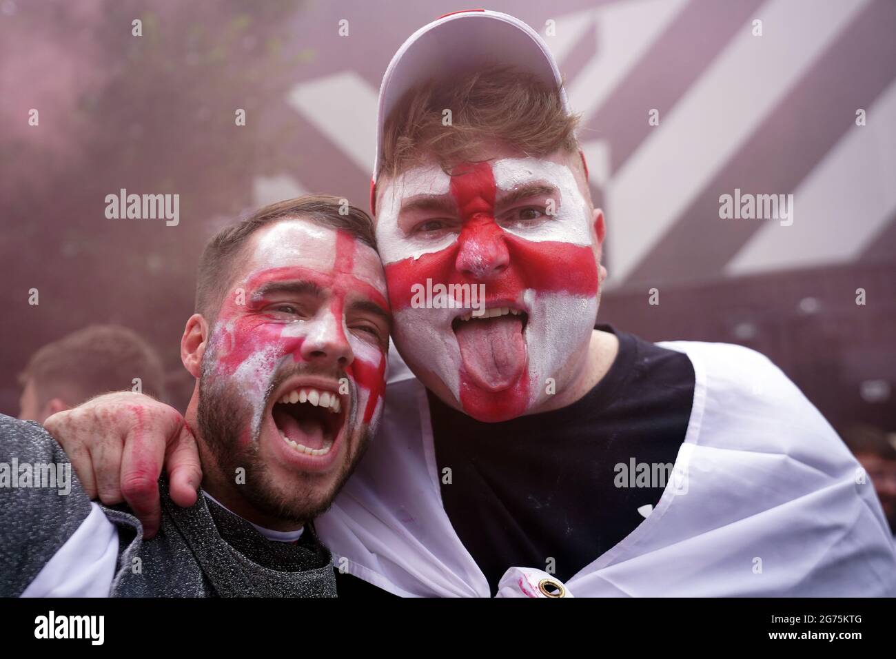 Face painted England fans outside the ground ahead of the UEFA Euro ...