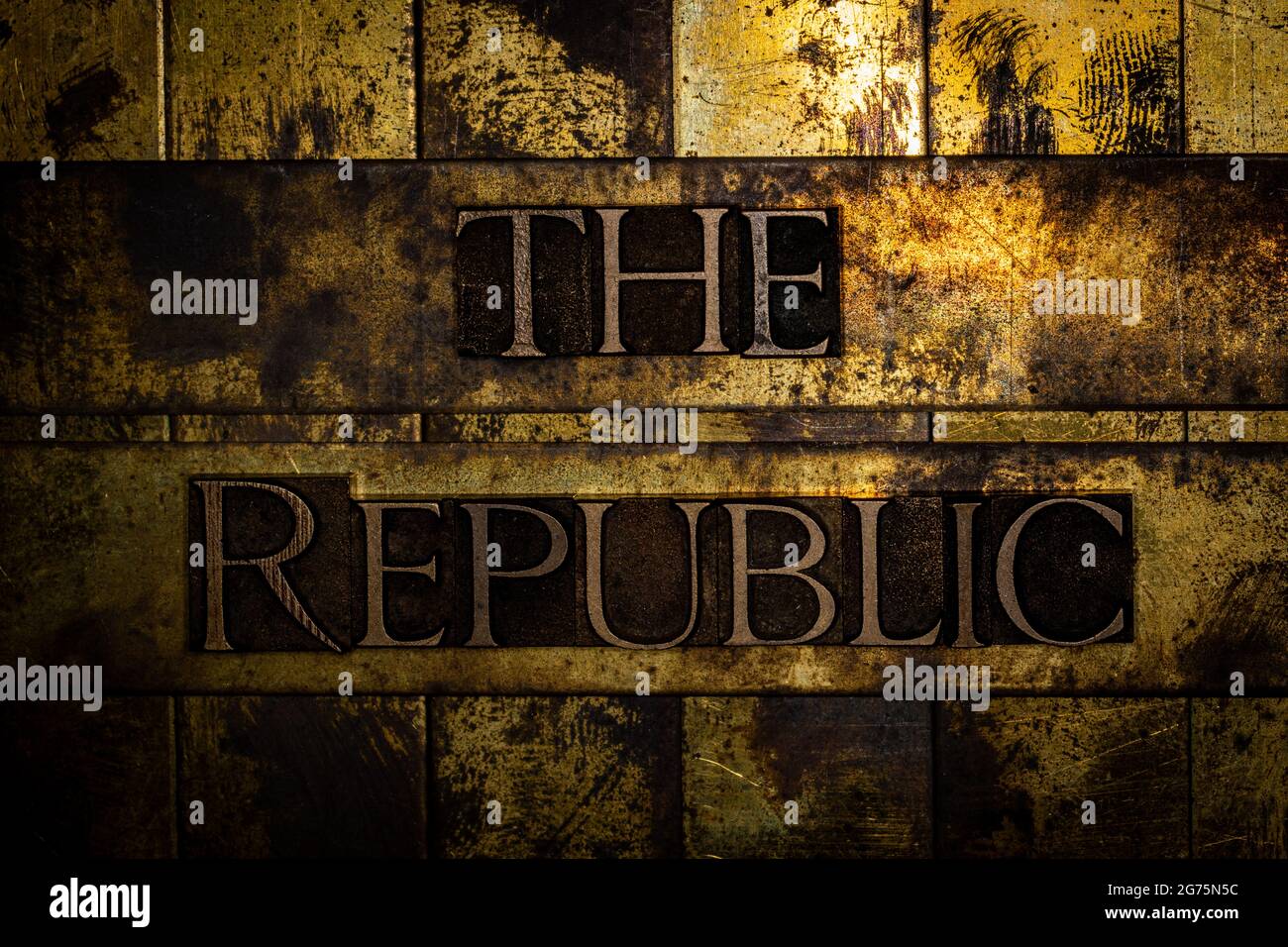 The Republic text on vintage textured copper and gold background Stock ...