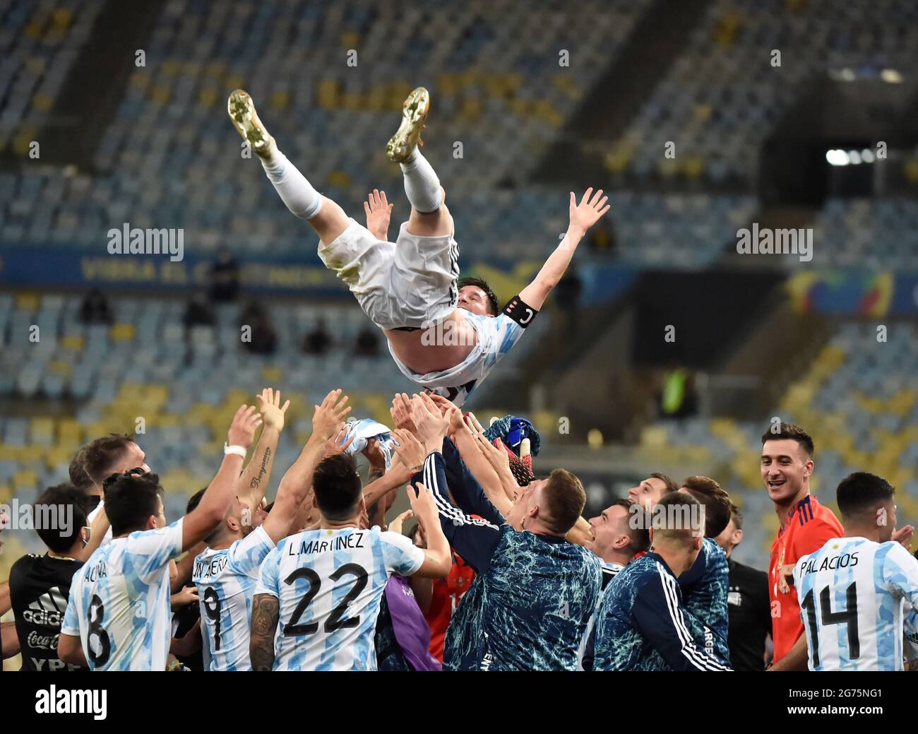 Teammates lift Argentina's Lionel Messi after beating Brazil 1-0 during ...