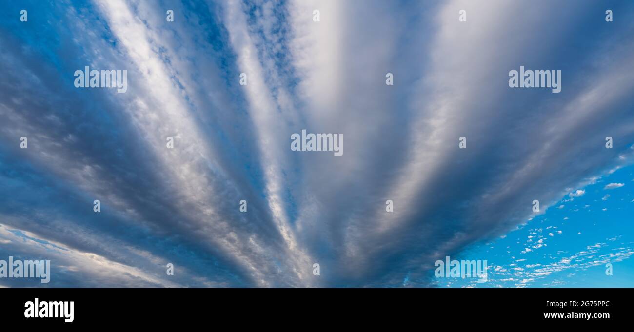 Cloudscape background with deep blue sky, wide angle view Stock Photo ...