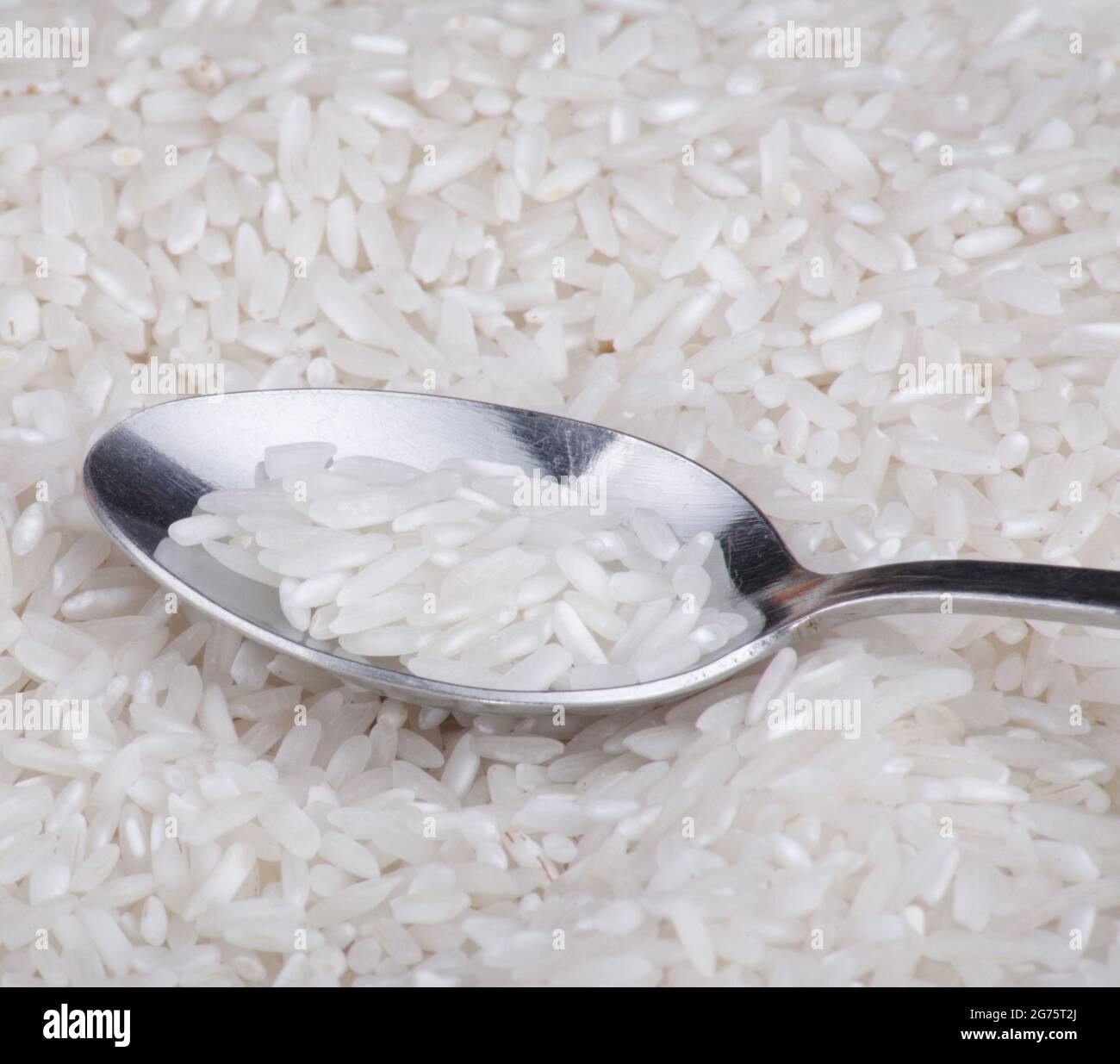 rice food background and teaspoon Stock Photo - Alamy