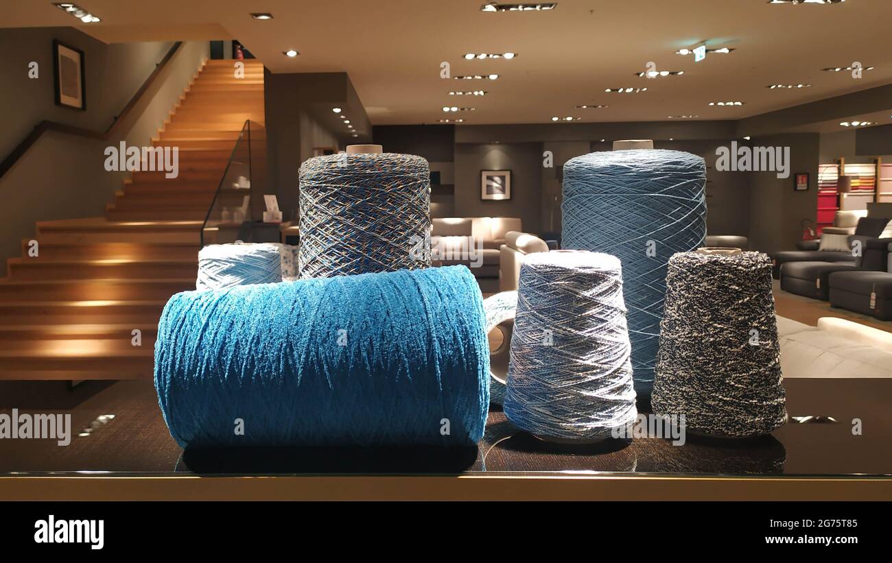 Roll of wool fiber threads, colors analogous to blue Stock Photo - Alamy