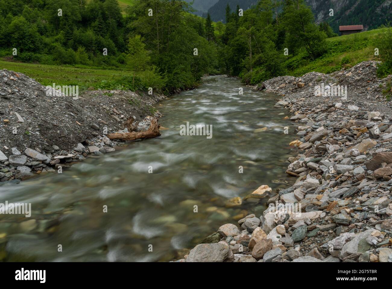 Valley with color small river in Austria Alps mountains near Kree ...