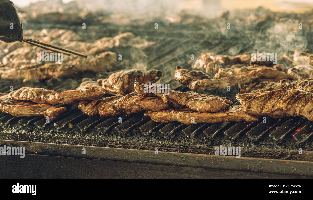 Cooking meat on fire chef hi-res stock photography and images - Alamy