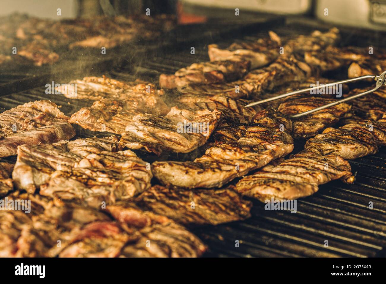 Meat Cooking in the Grill Stock Photo - Alamy