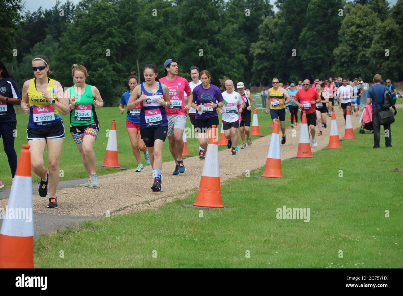 big group of diverse people in a running race Stock Photo - Alamy