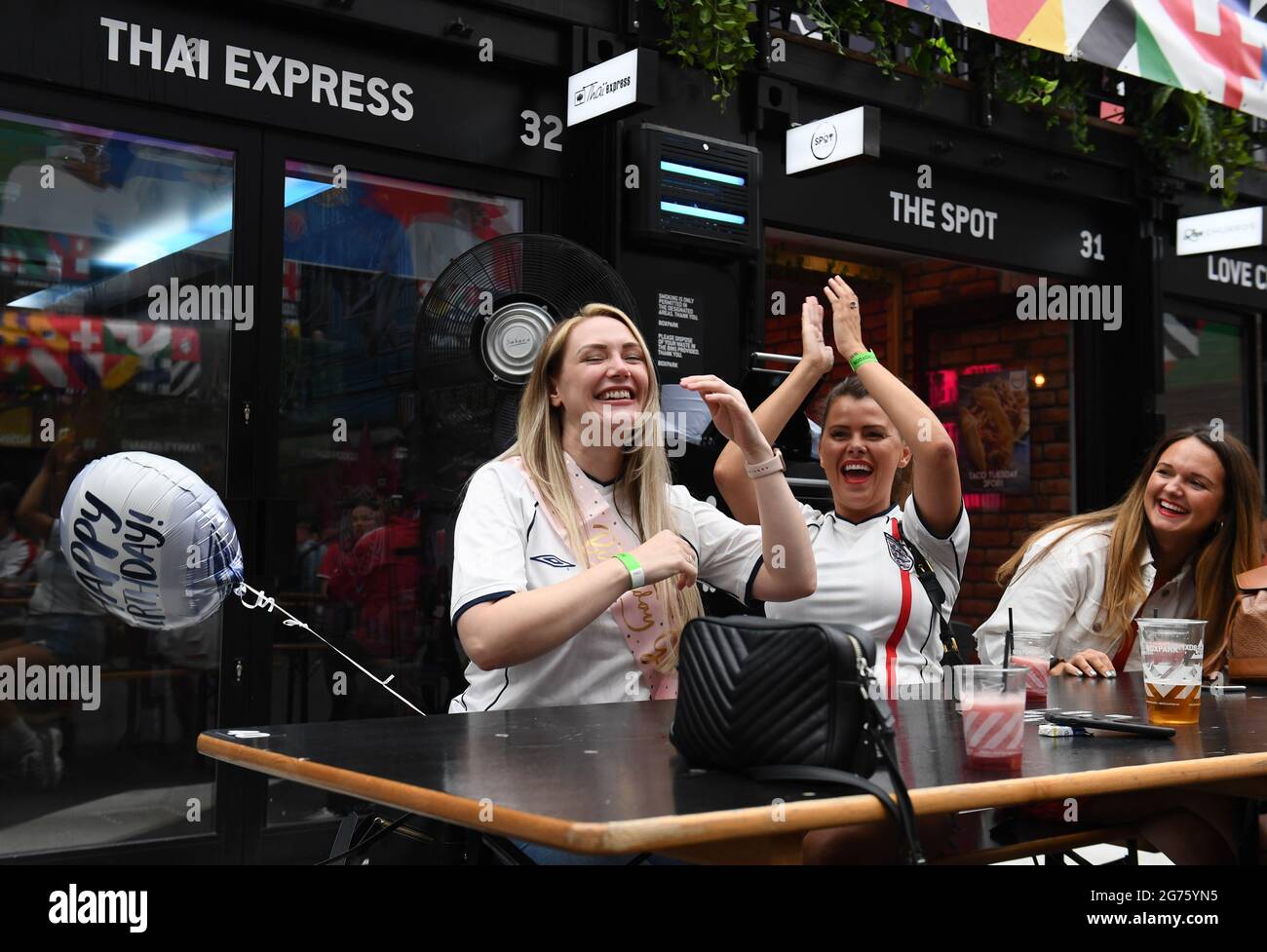An England fan celebrates a birthday at BOXPARK Croydon before the UEFA ...