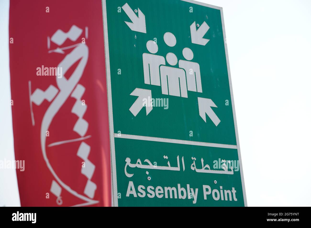 White assembly point sign on hi-res stock photography and images - Alamy