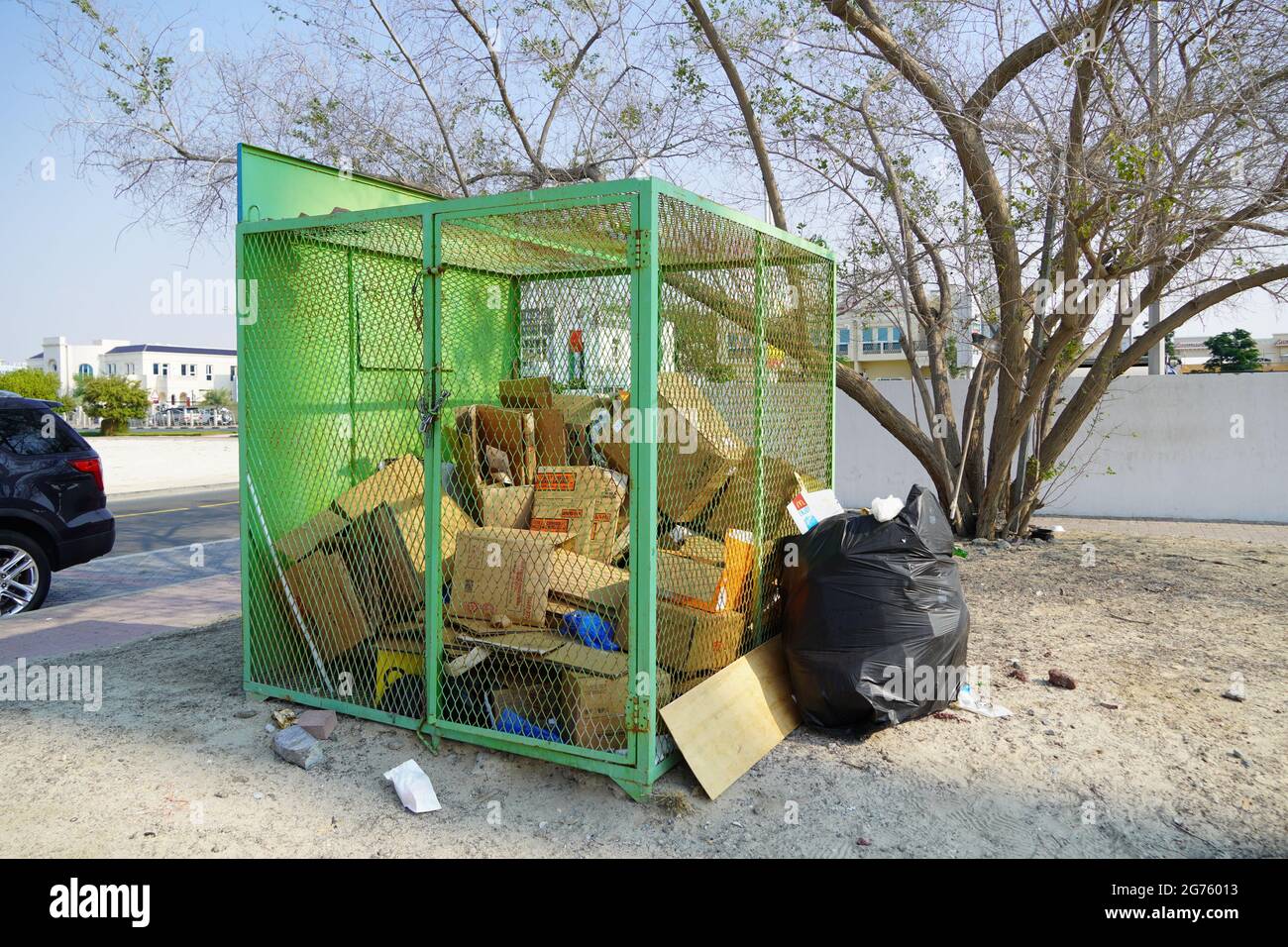 Dubai UAE December 2019 Overflowing Black full garbage bag isolated ...