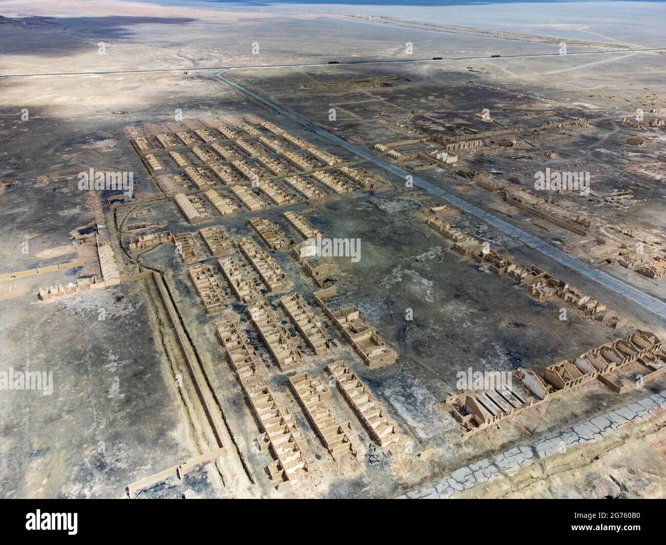 An aerial shot of the abandoned and destroyed oil base site in Lenghu ...