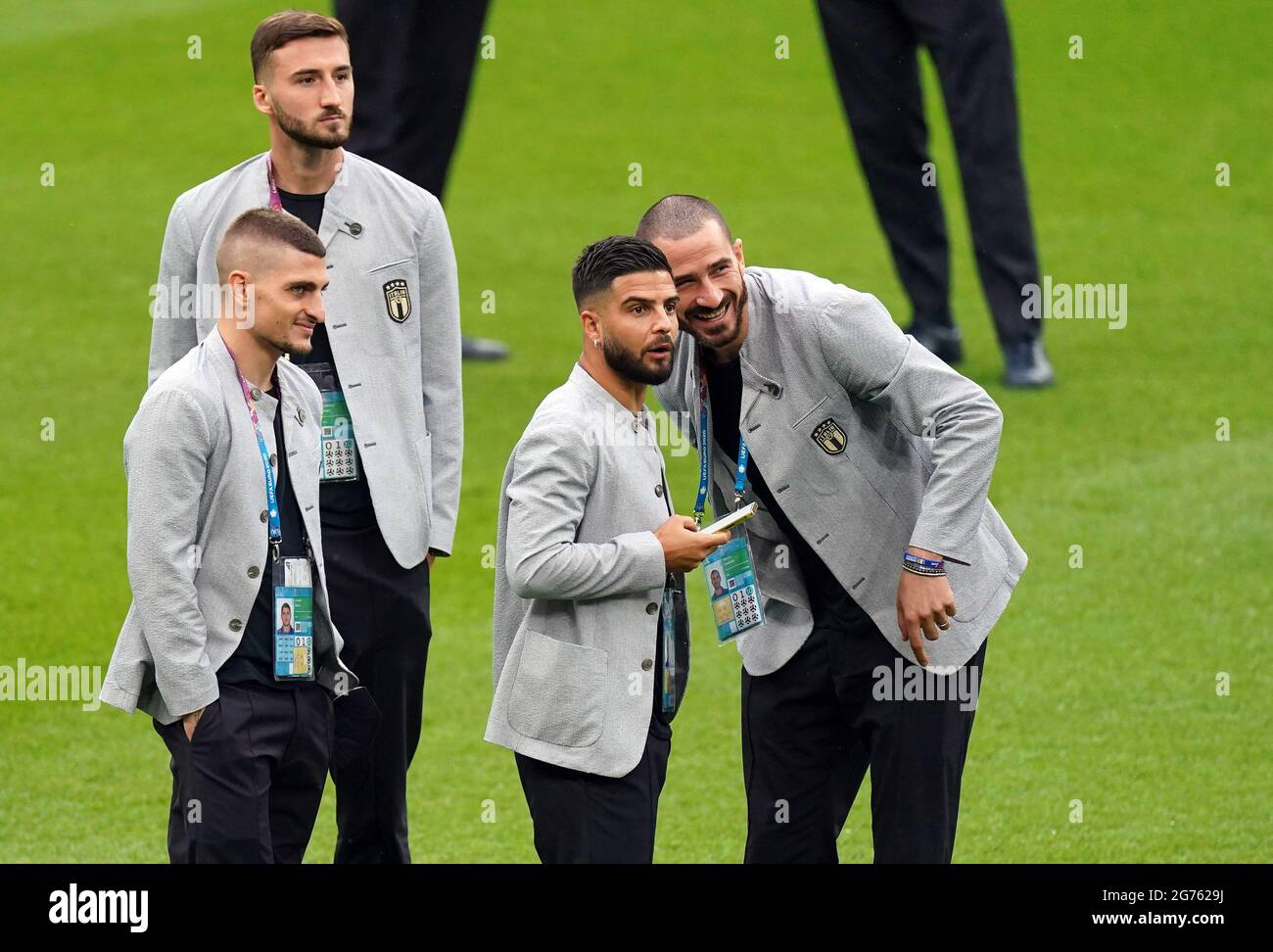 Italy's Leonardo Bonucci (right) with Lorenzo Insigne (centre), Marco ...