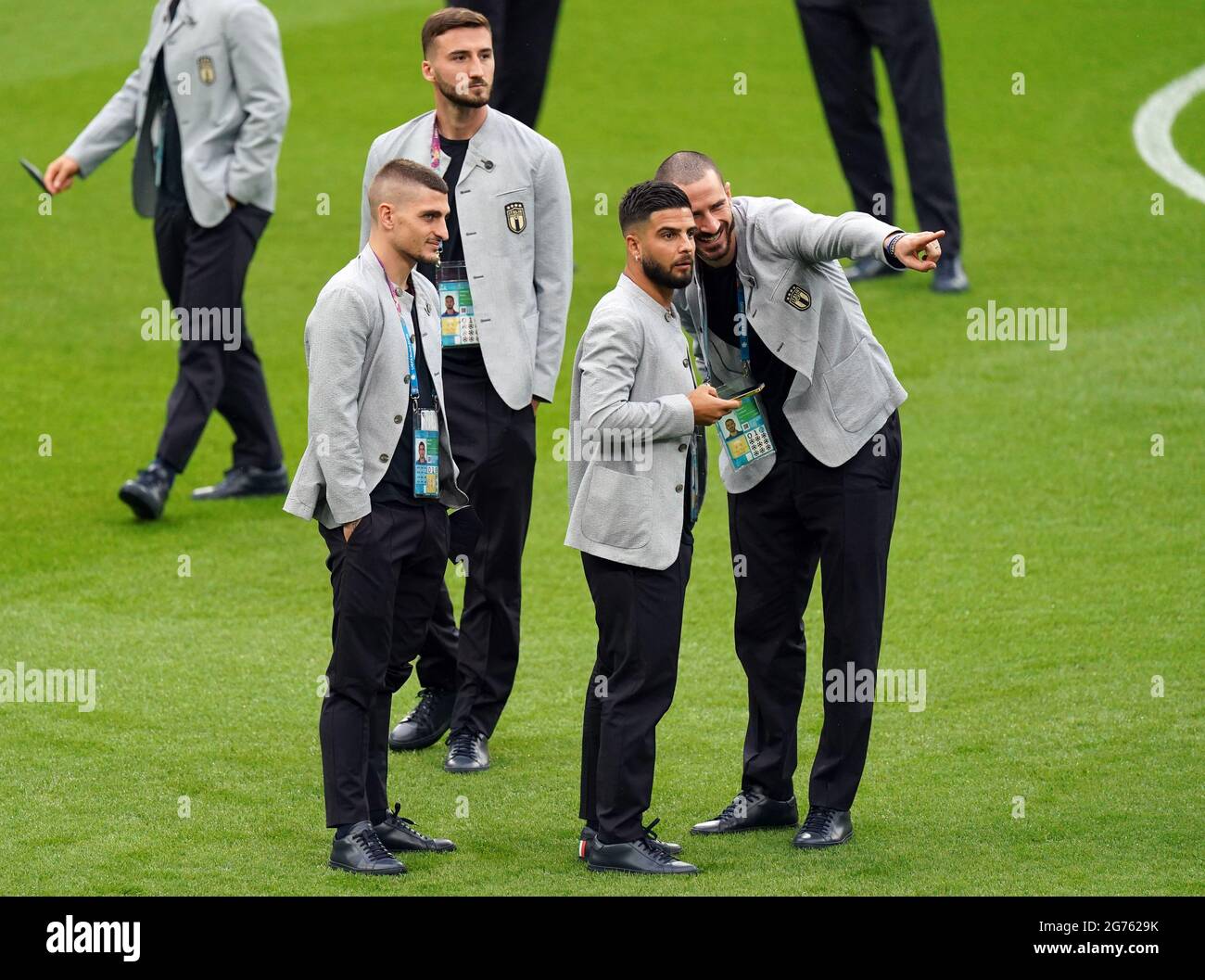 Italy's Leonardo Bonucci (right) with Lorenzo Insigne (centre), Marco ...