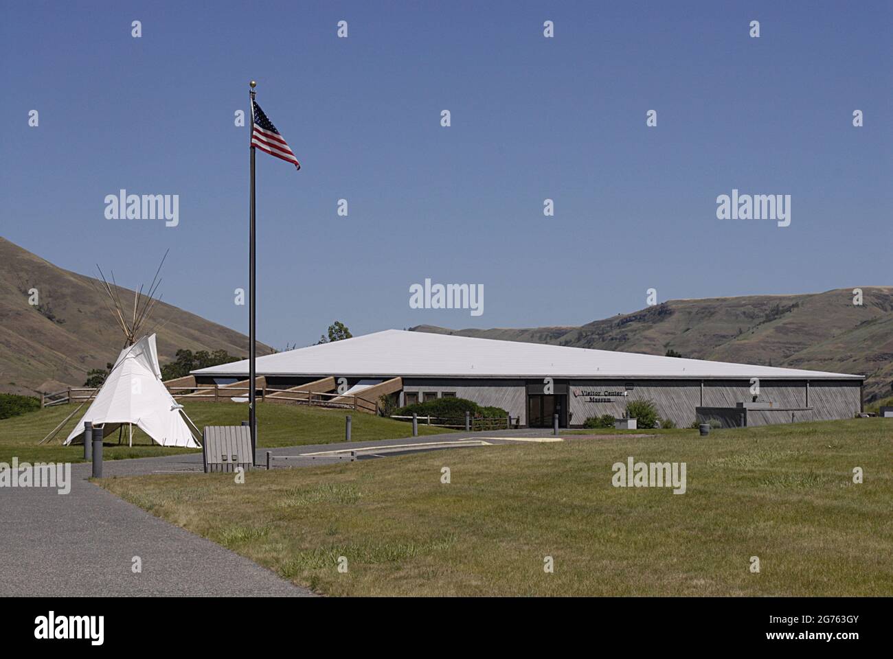 SPALDING / IDAHO STATE/ USA . United States flag and Indian Tepe at Nez ...