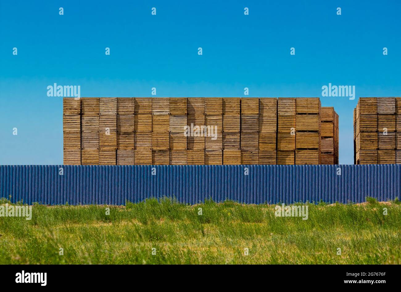Storage of cargo in the open sky. Warehouse transport node of temporary ...