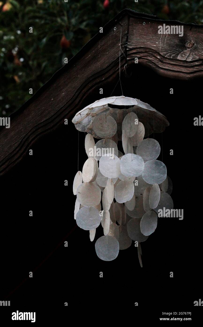 Wind bell made using copper rods and seashells. Decorative wind chime ...