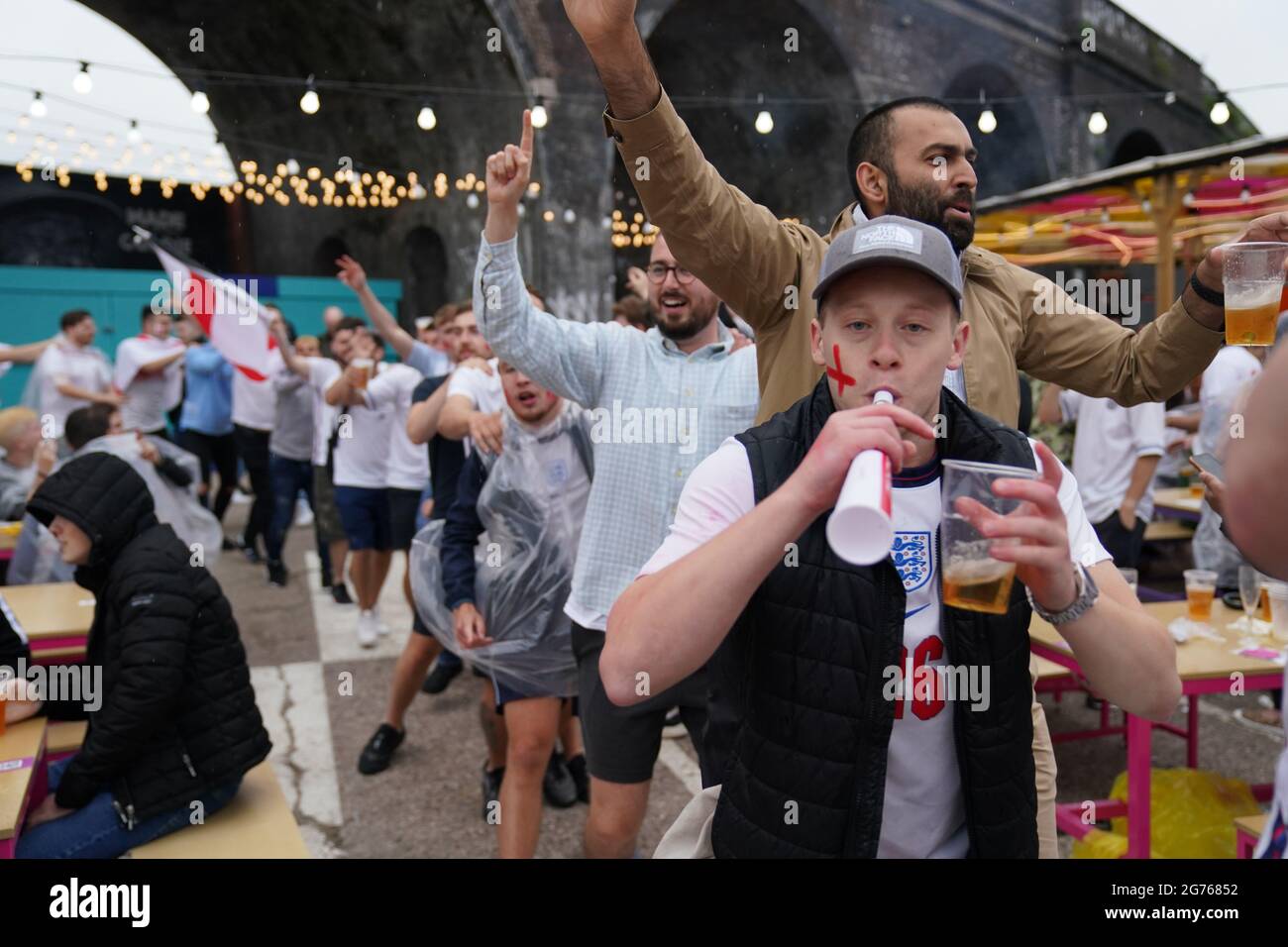 England fans dancing in a conga line at Luna Springs in Birmingham ...