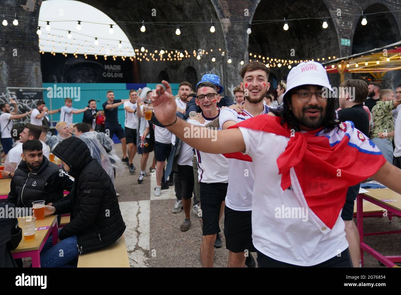 England fans dancing in a conga line at Luna Springs in Birmingham ...