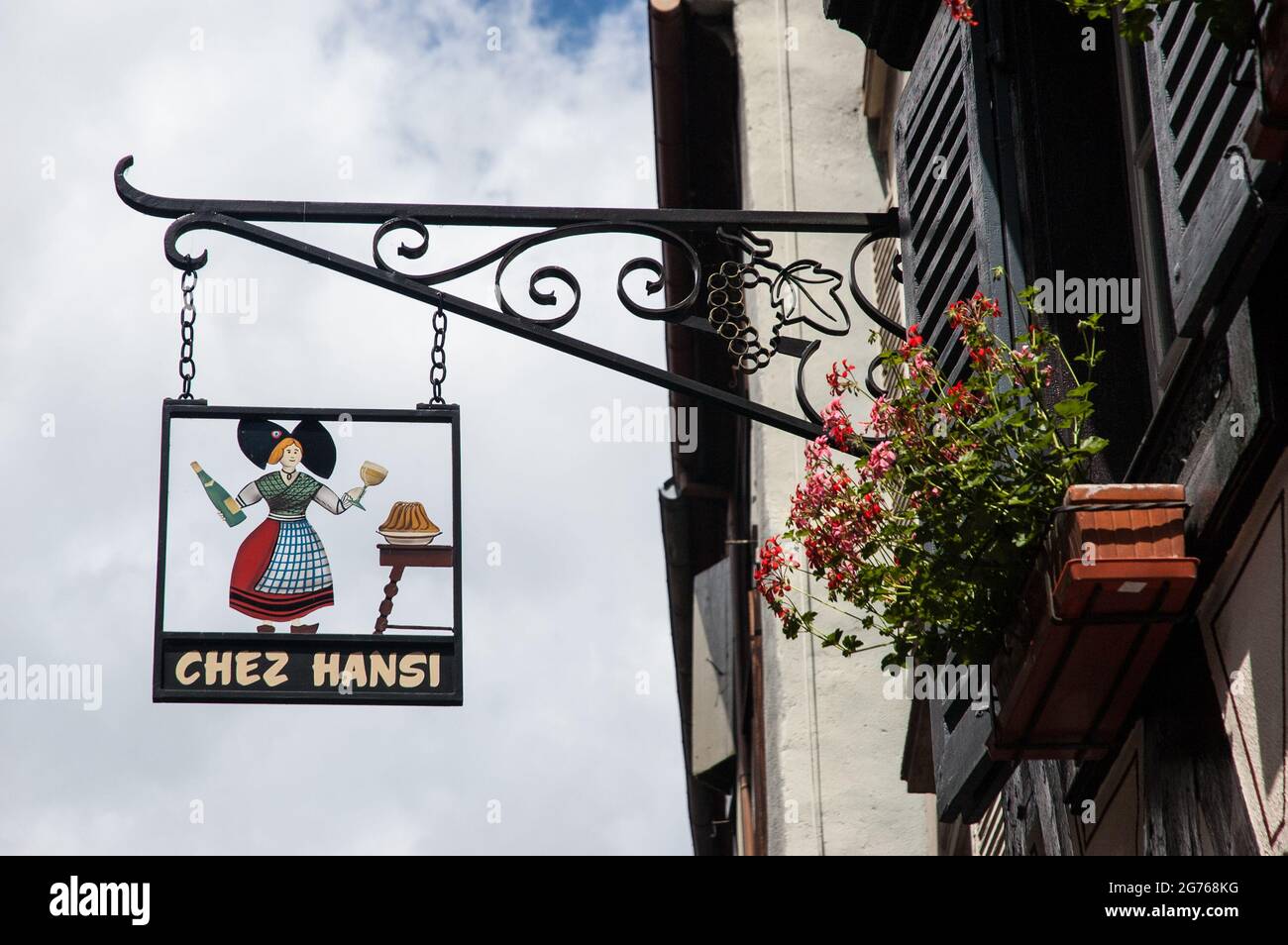A traditional sign at Chez Hansi restaurant in the historic centre of ...
