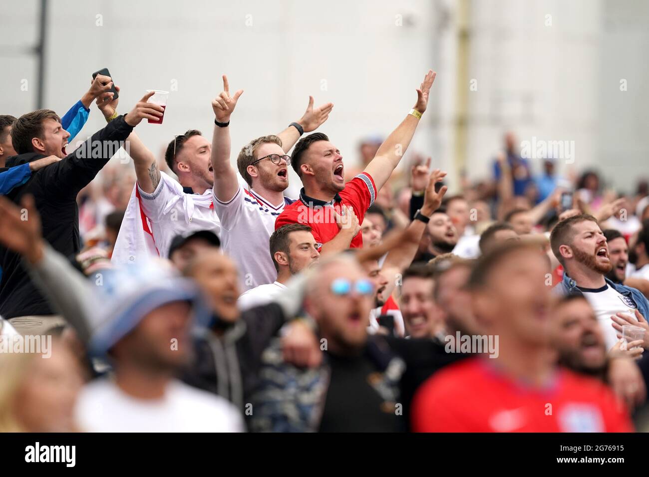 England fans at the fan zone in Trafford Park, Manchester as they watch ...