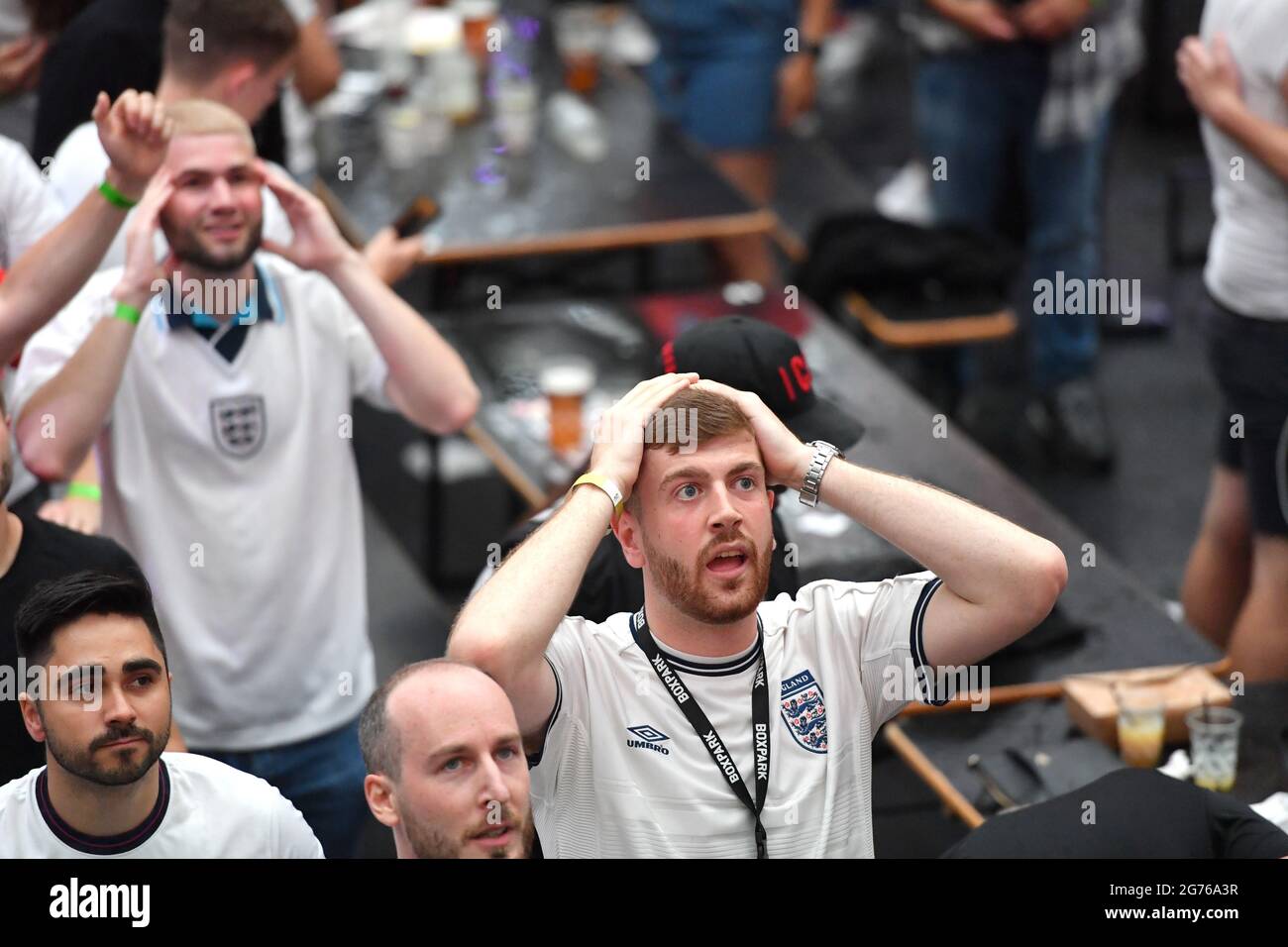 England fans at BOXPARK Croydon react as they watch the UEFA Euro 2020 ...