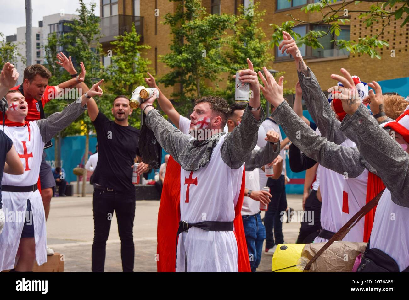 London, UK. 11th July, 2021. England football fans wearing knight ...