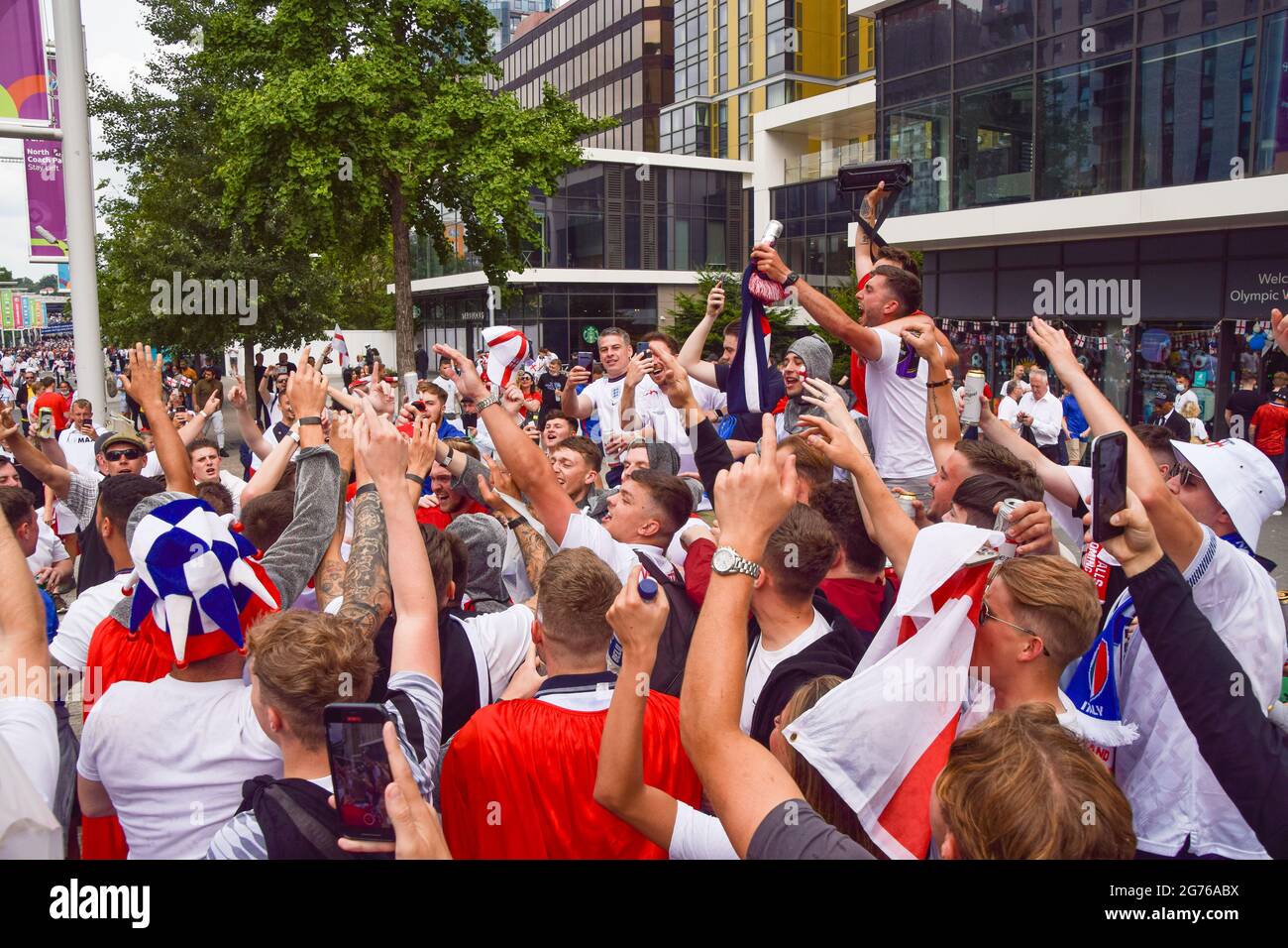 London, UK. 11th July, 2021. England football fans sing outside Wembley ...