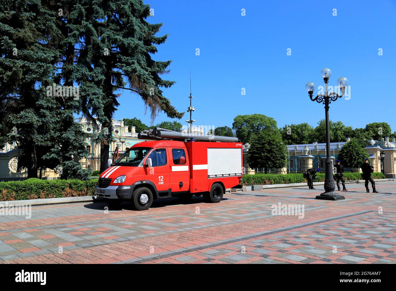 A red fire engine stands near the Verkhovna Rada of Ukraine ...