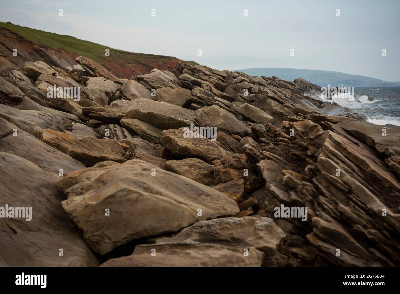 Rugged sedimentary rock along the shore of the St. Lawrence on Nova ...