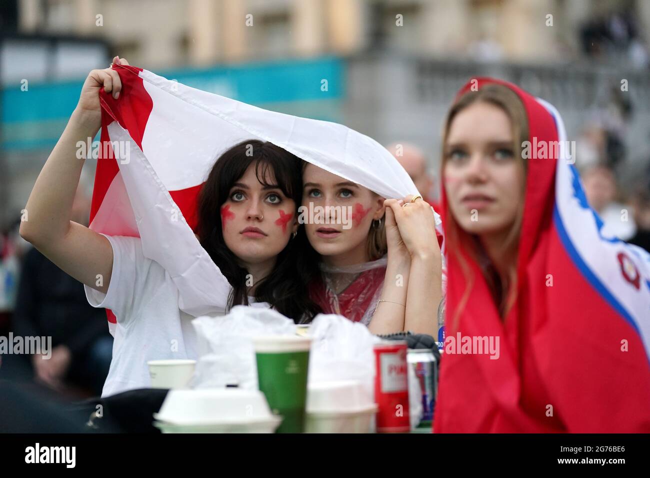 England fans at the Trafalgar Square Fan Zone in London as they watch ...