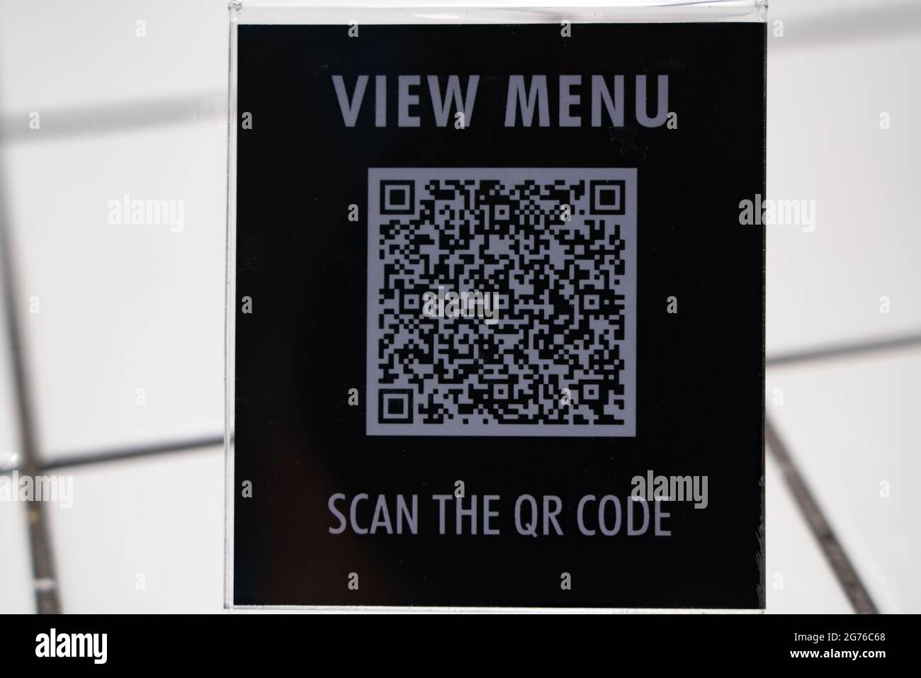 View menu and Scan the QR code sign on the table in the cafe Stock ...