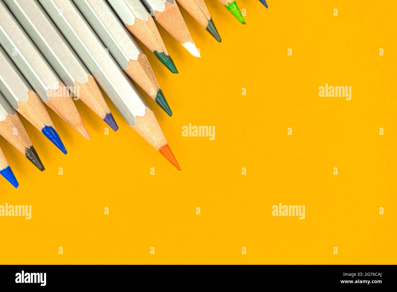 Sharp tips of school drawing pencils on a bright background. Education ...