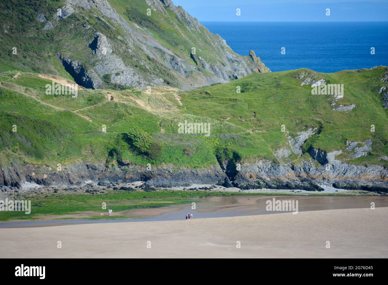 Elevated view of Three Cliffs Bay in the Gower, a stunning sandy cove ...