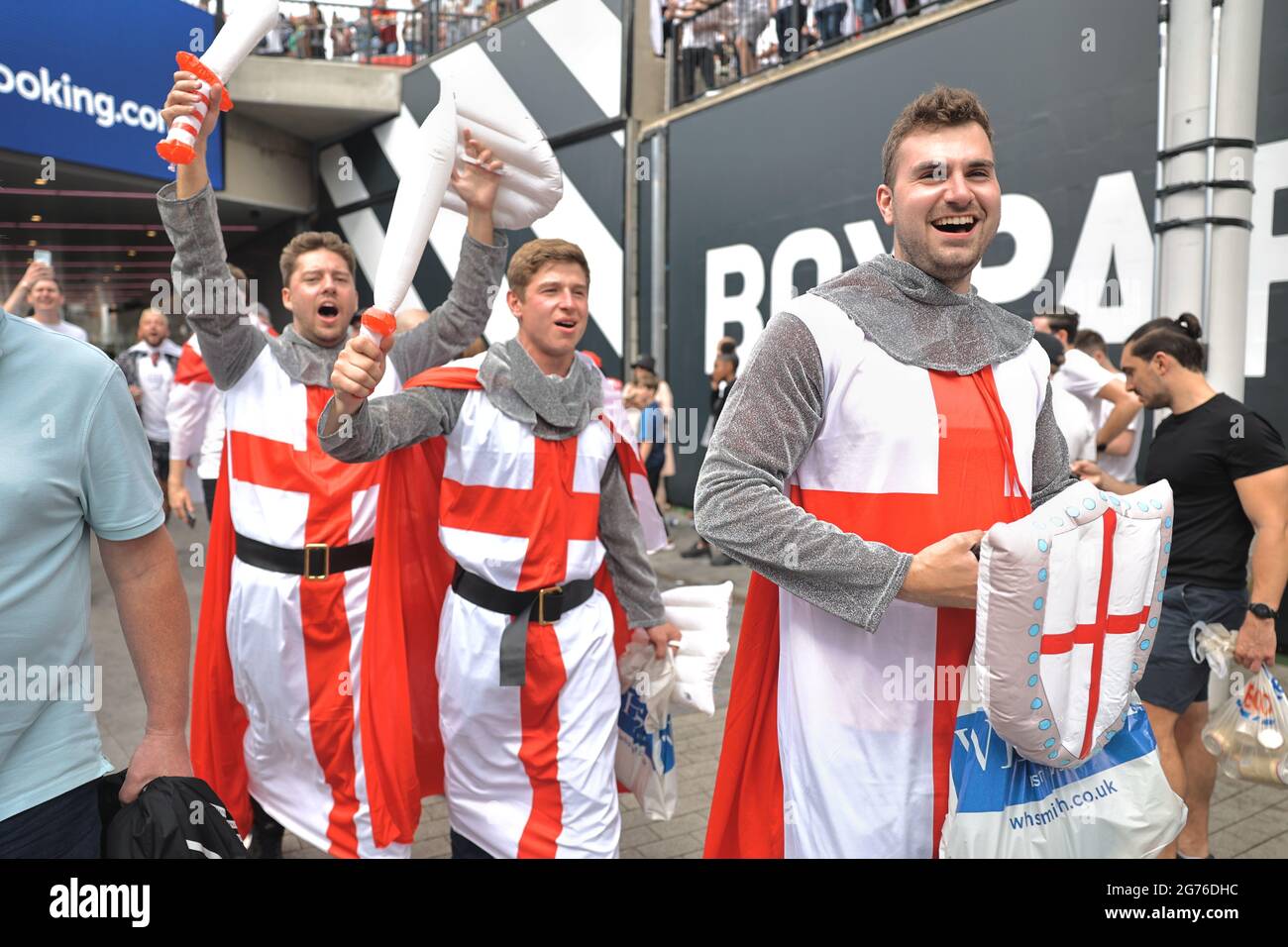London, UK. 11th July, 2021. England football fans dress up as knights ...