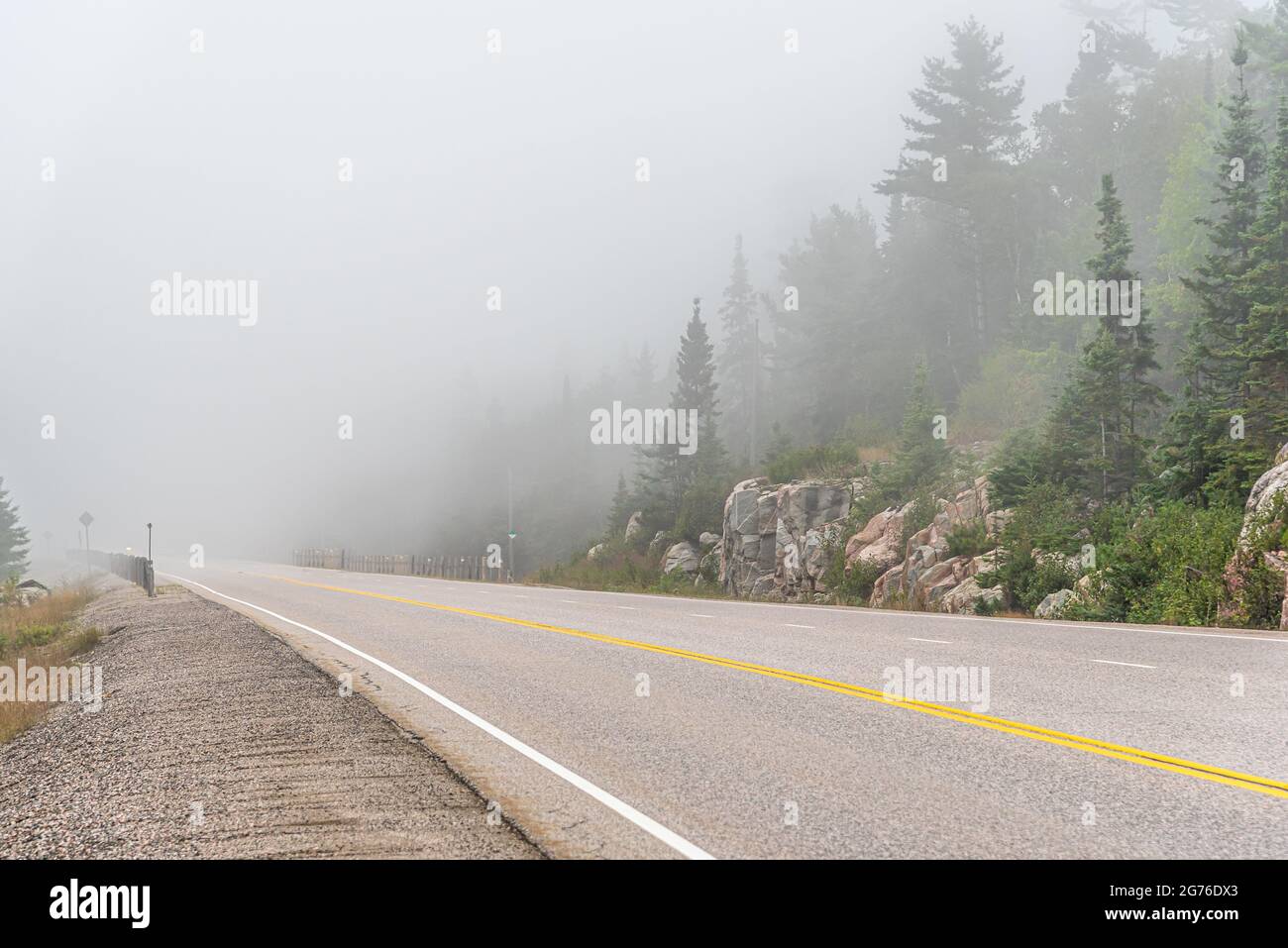 Strong fog on forest hills near Superior Lake, canada Stock Photo - Alamy