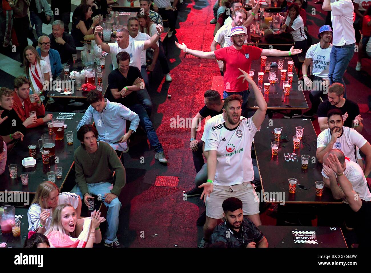 England fans at BOXPARK Croydon react as they watch the UEFA Euro 2020 ...