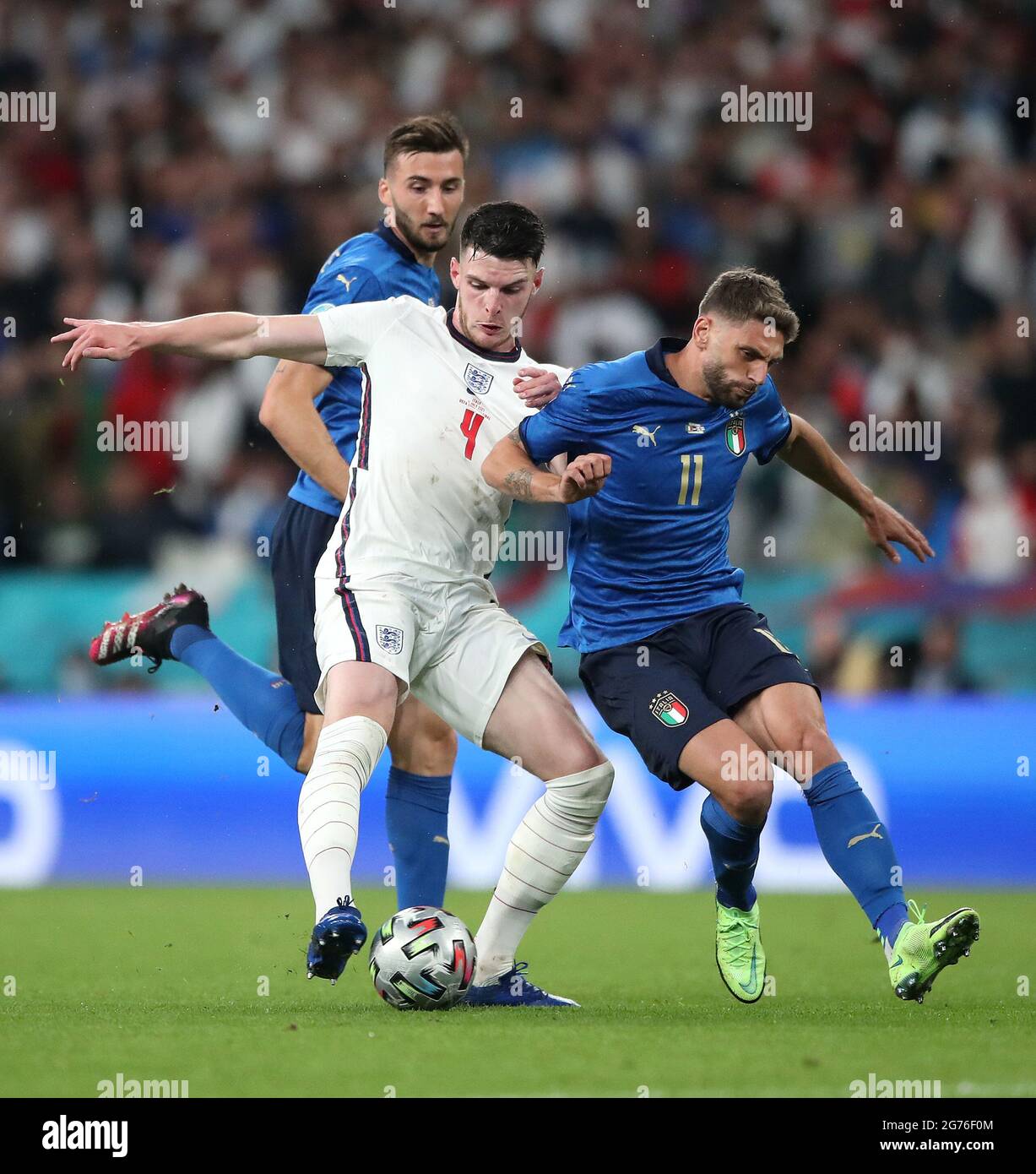 England's Declan Rice (centre) battles with Italy's Bryan Cristante ...