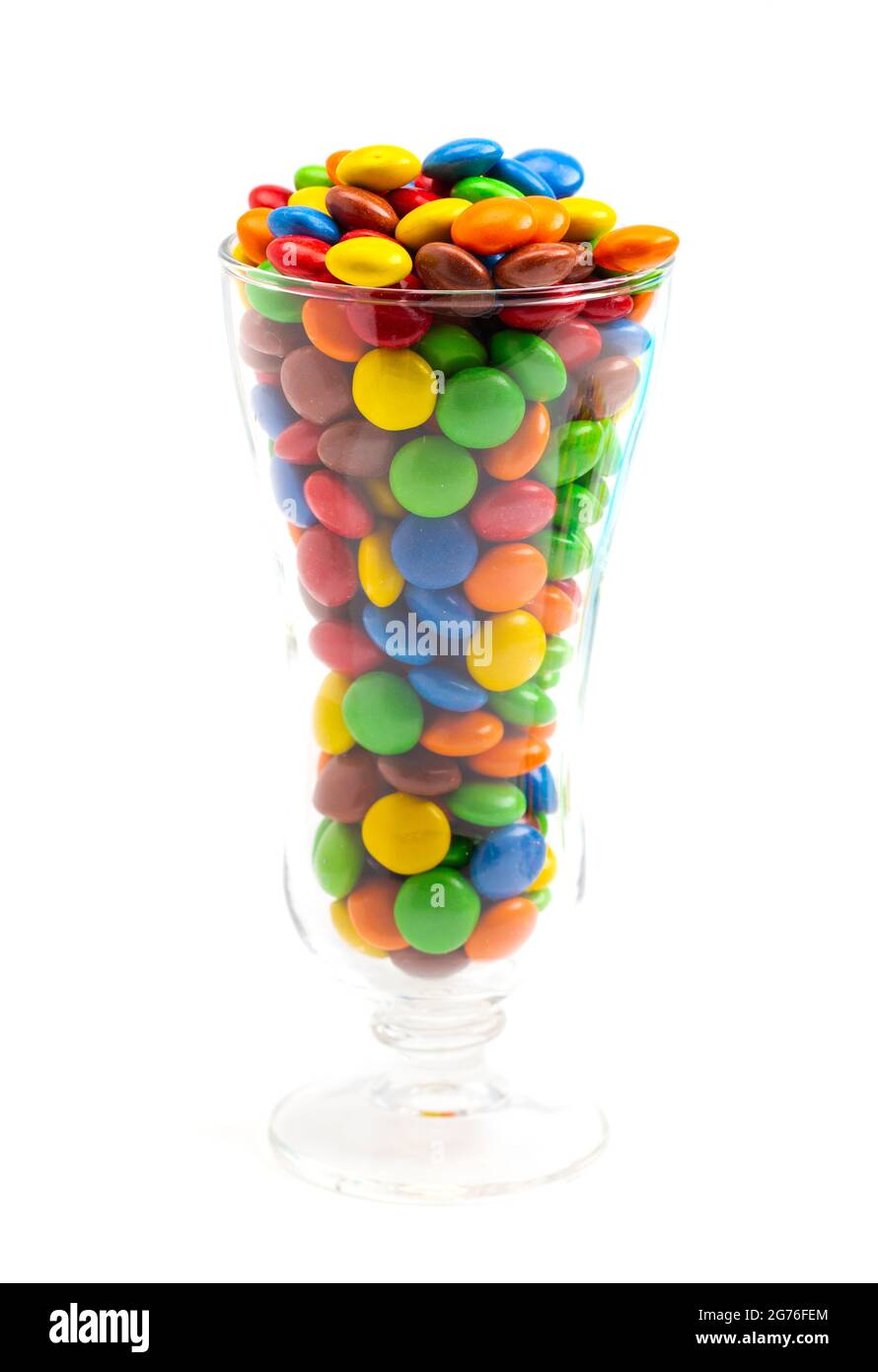 Rainbow Colored Candy Coated Chocolate Buttons in a Glass Jar Isolated ...