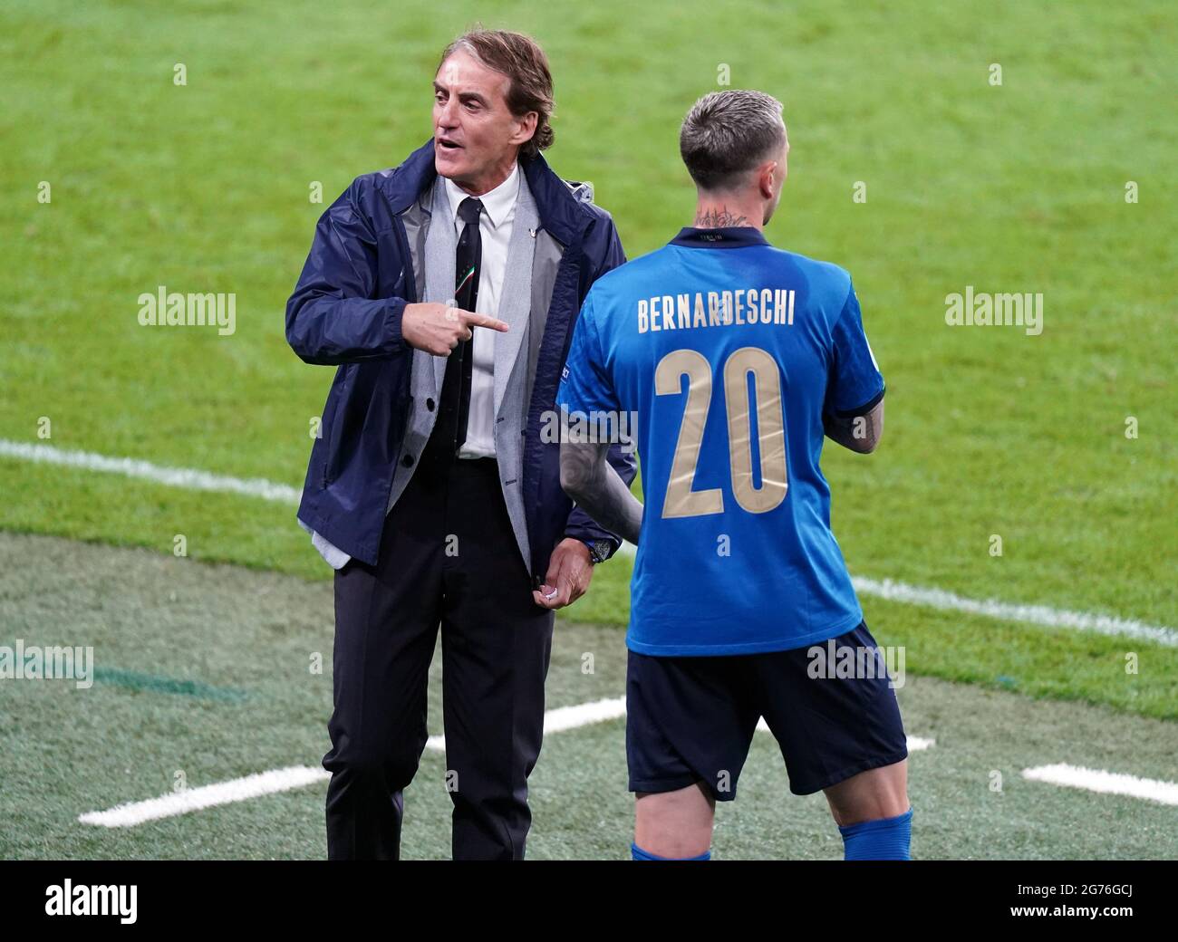 Italy manager Roberto Mancini with Federico Bernardeschi (right) during ...